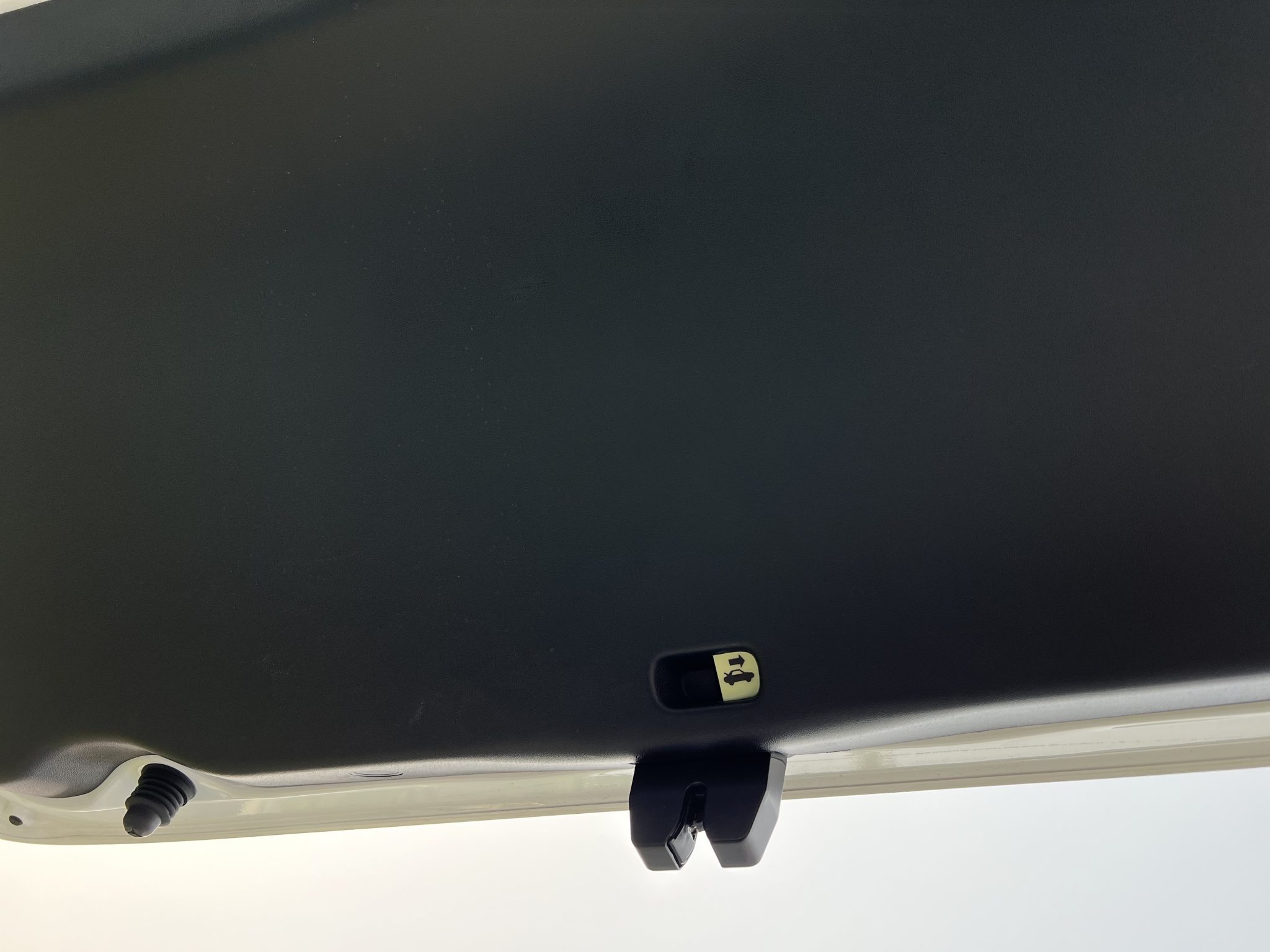 Where to Find the Interior Emergency Trunk Release on a Tesla Model 3 ...